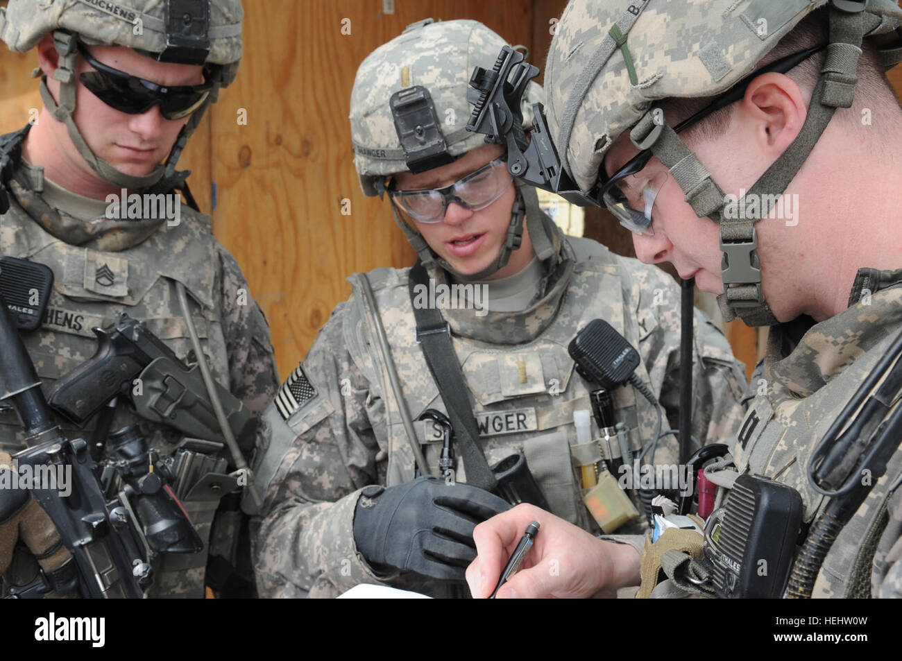 U.S. Army Staff Sgt. Perry Houchens (left) and 2nd Lt. Richard Shawger ...