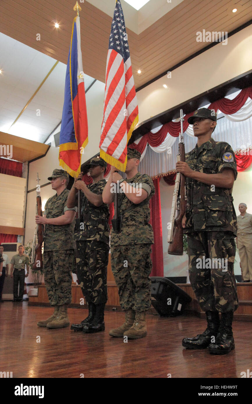 Members of a multinational color guard display the U.S. and Republic of ...