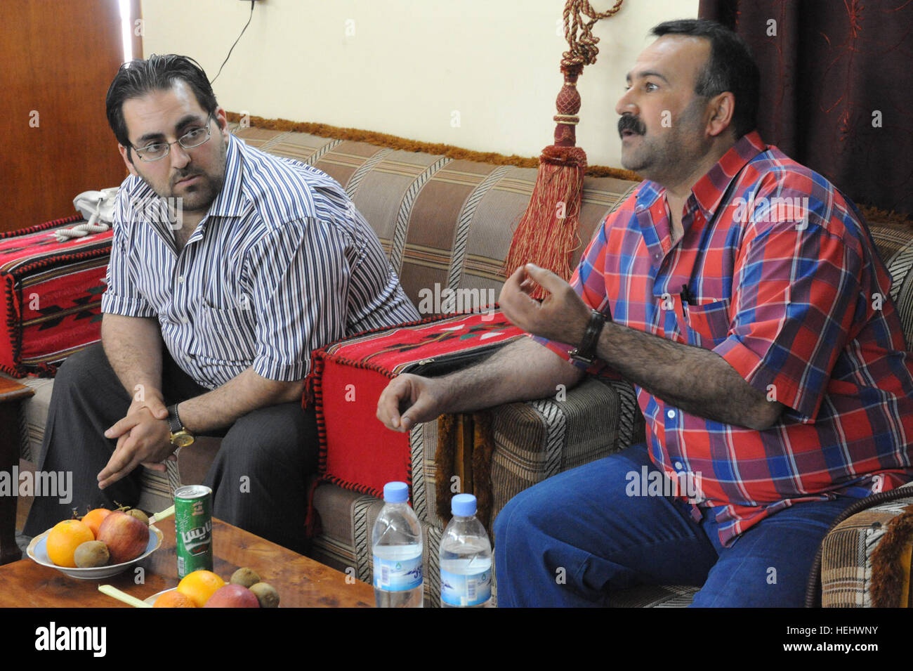 A Iraqi engineer discusses water problems in a meeting between 1st ...