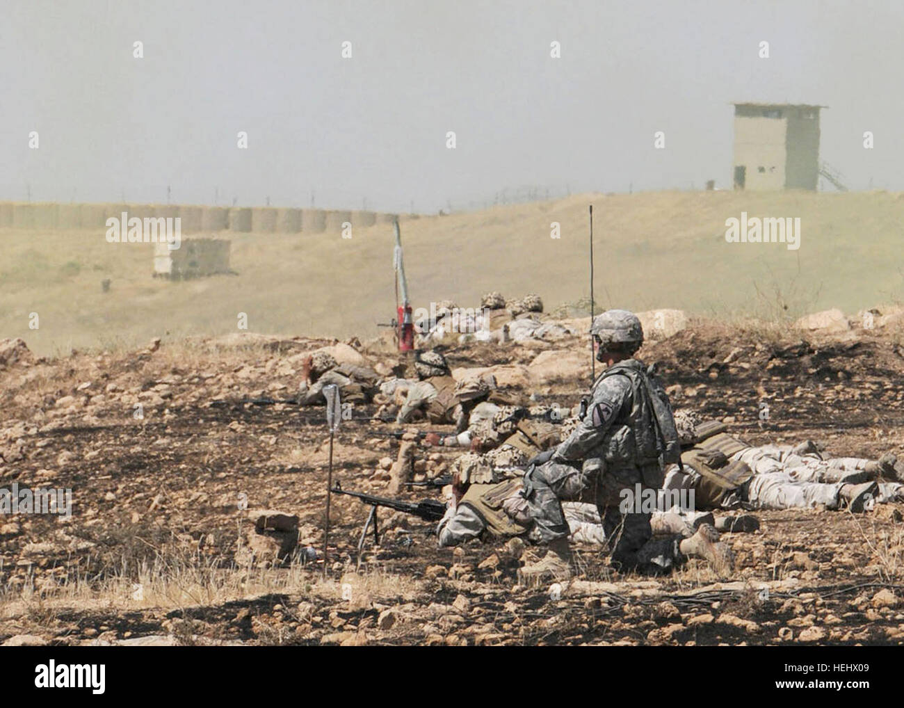 Observing from beside Iraqi soldiers. CONTINGENCY OPERATING SITE MAREZ ...