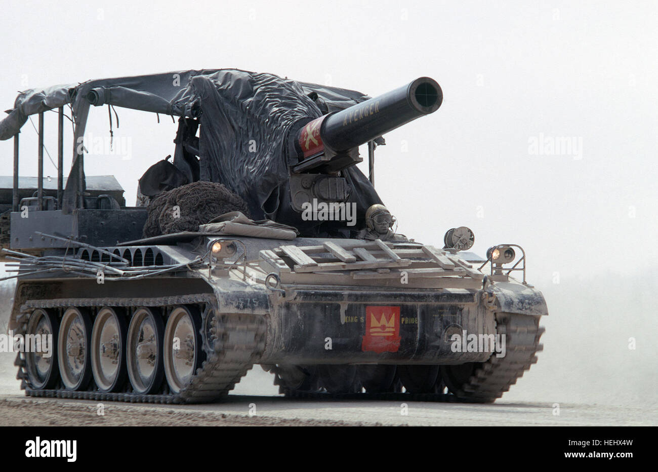 A right front view of an M110 203 mm self-propelled howitzer underway during a training exercise ...