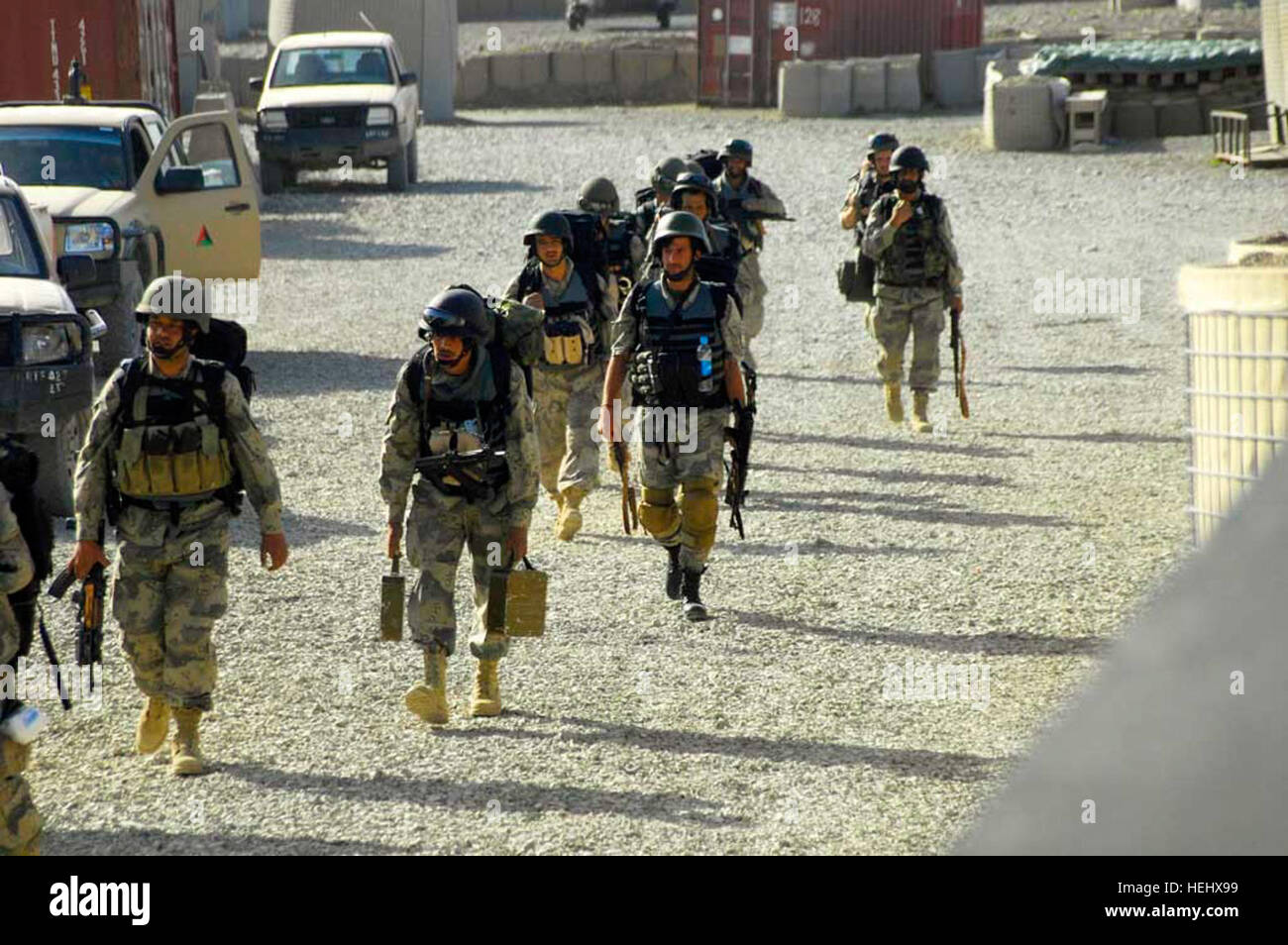 Afghanistan border police walks toward Forward Operating Base Orgun-E ...