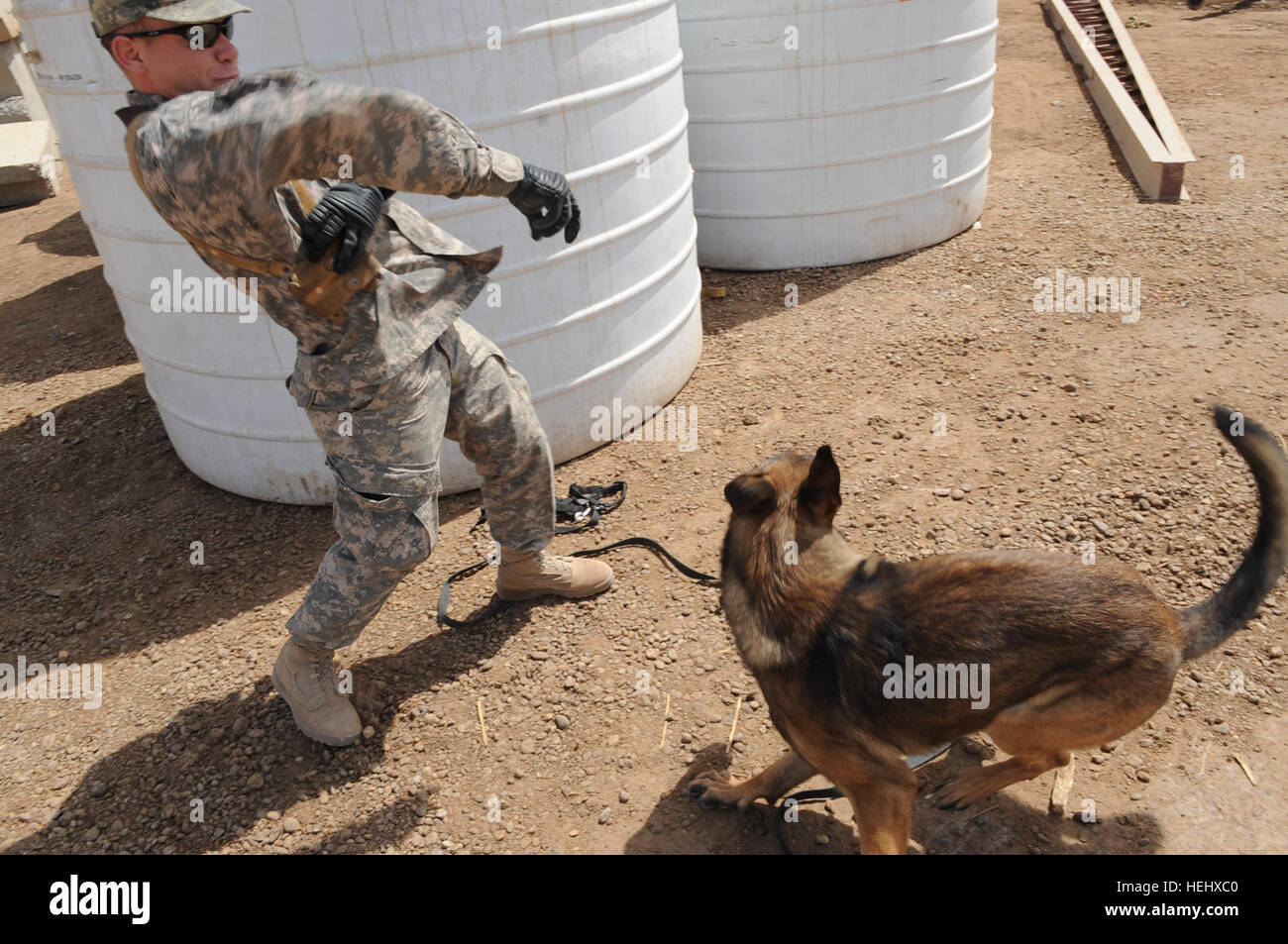 U.S. Army Sgt. Brett Fishel from El Dorado, Kan., a dog handler ...