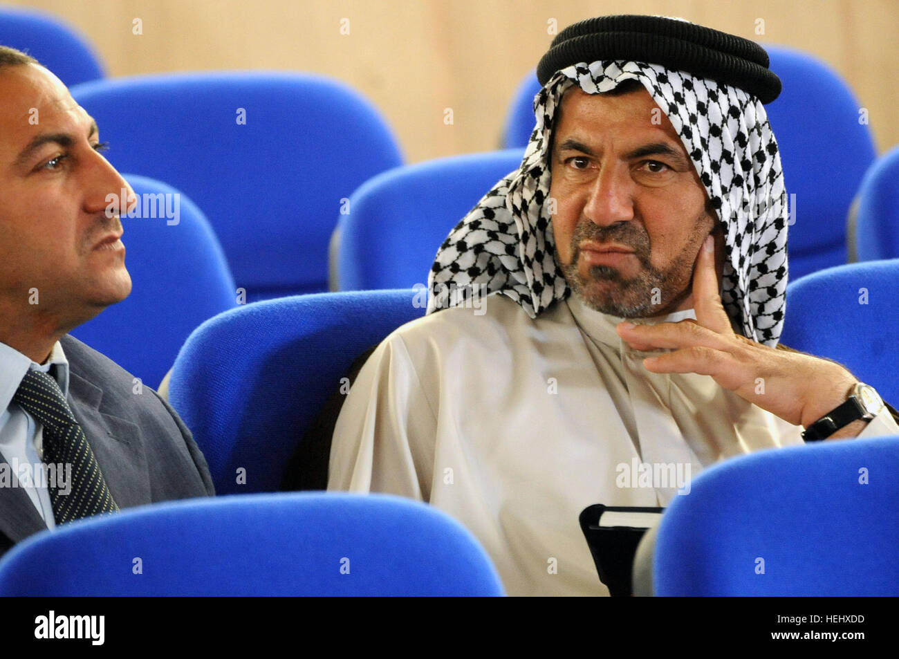 A Sheikh representing a region for the Sunni organization, Sahwa, waits ...