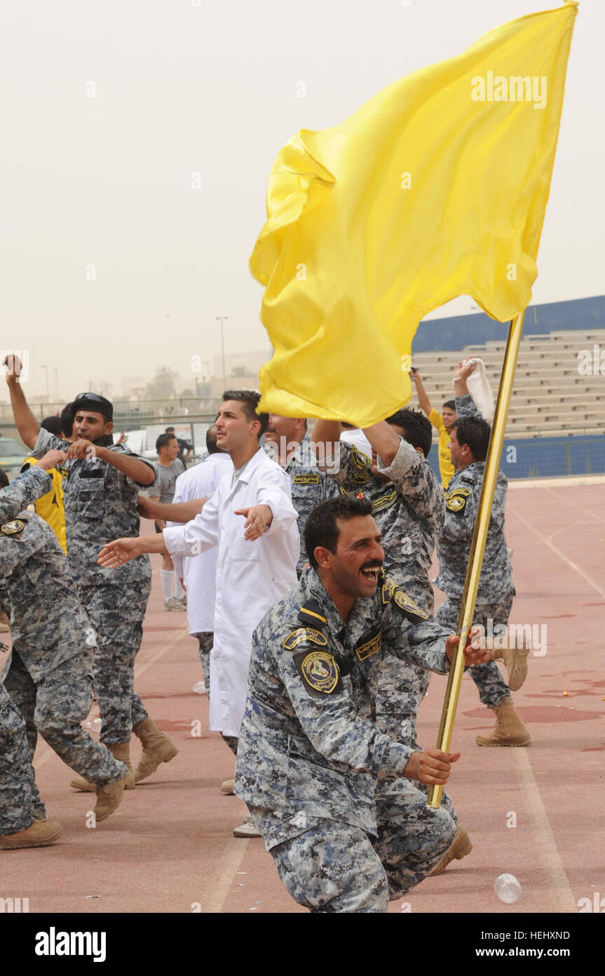 Iraqi national police wave the team flag and celebrate with music and ...