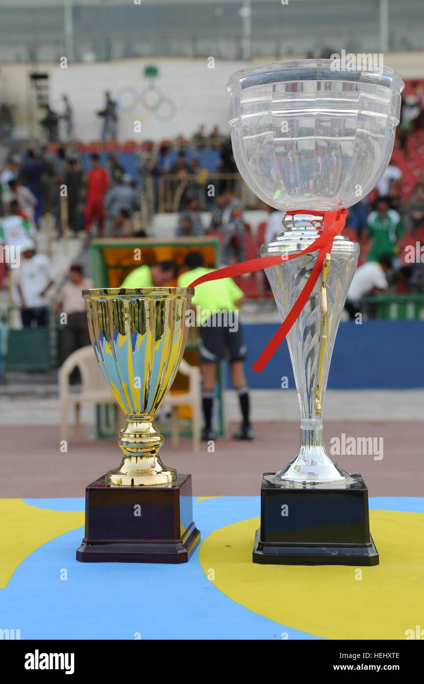 Trophies sit on a table on the sidelines during soccer finals at Sha'ab ...
