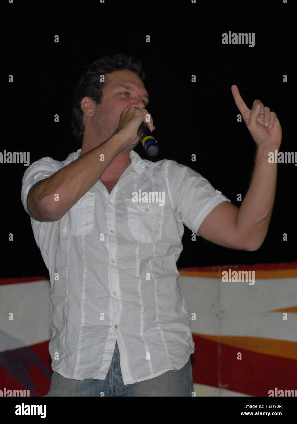 Comedian Dane Cook makes a comedic point during a show funded by the ...