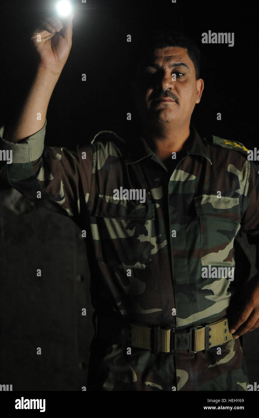 An Iraqi army captain leads U.S. Soldiers of Bravo Company, 1st ...