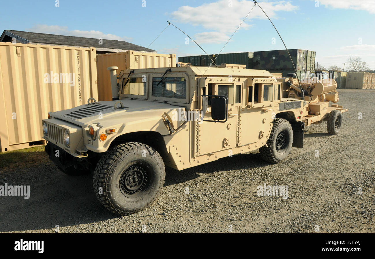 A humvee belonging to the Army Reserve's 431st Quartermaster Team tows ...