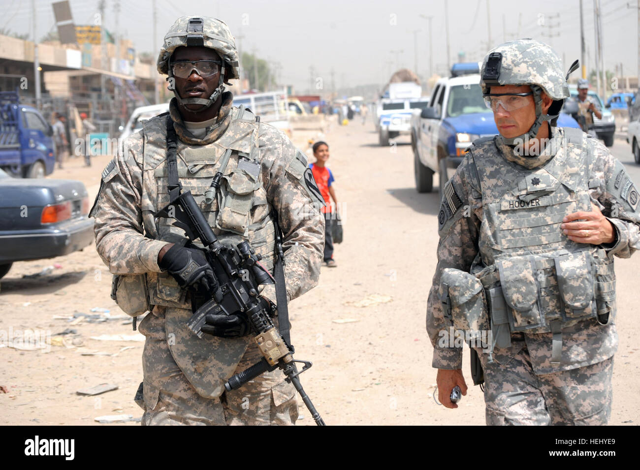 U.S. Army Lt. Col. Bruce Hoover (right) of 3rd Brigade Combat Team ...