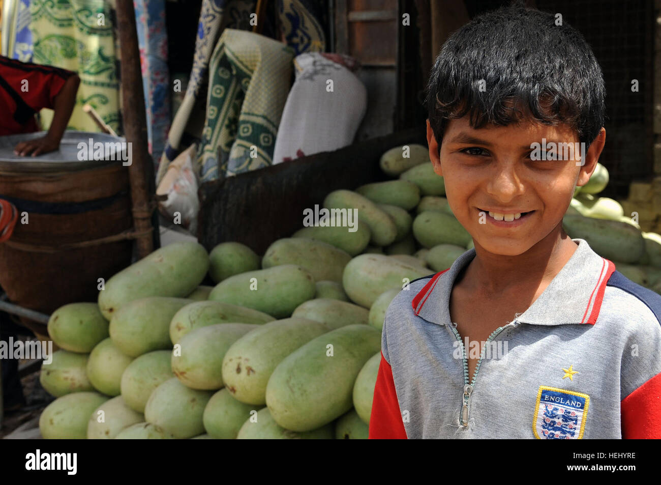 An Iraqi boy smiles for the camera at a market in eastern Baghdad, Iraq ...