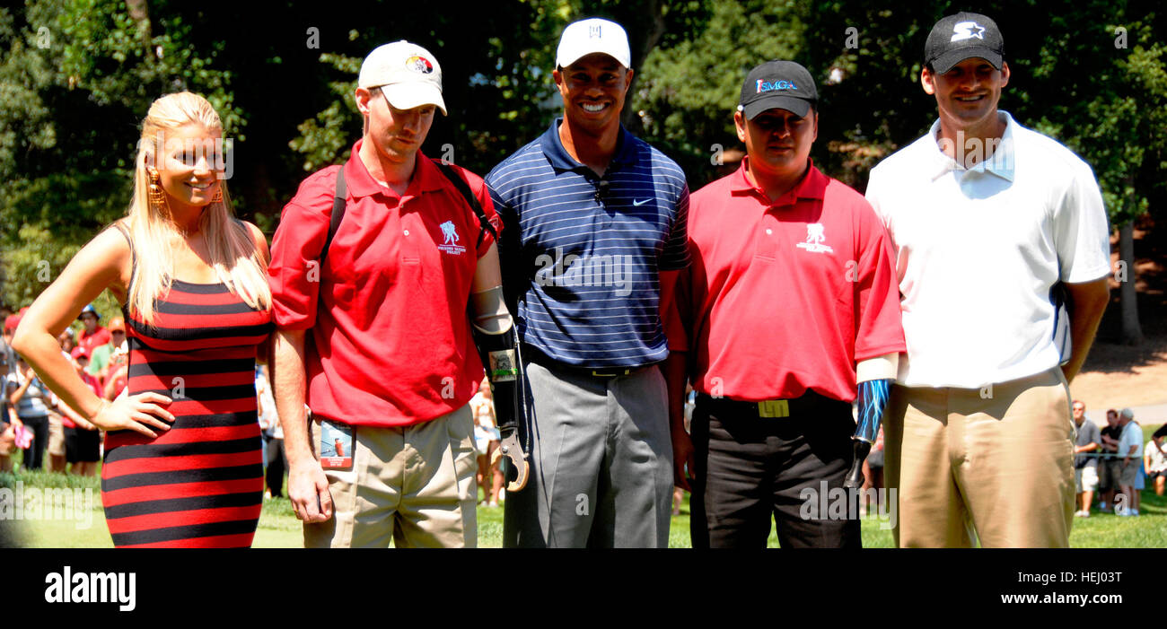From left, Jessica Simpson, U.S. Army Maj. Ken Dwyer, Tiger Woods, Sgt ...