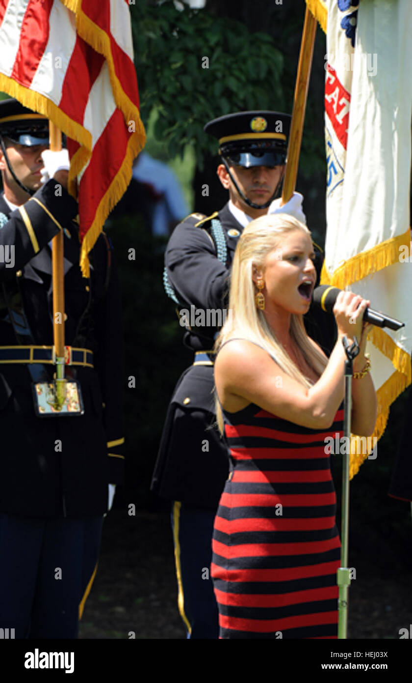 0979-JessicaSimpsonSingsAnthem.jpg: Jessica Simpson is surrounded by ...