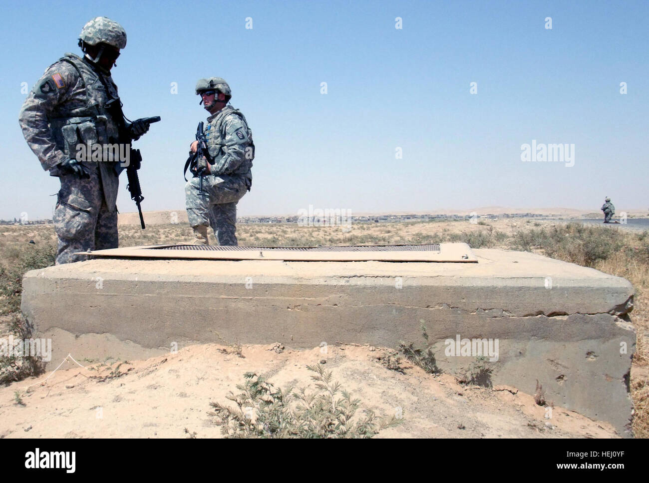 US Army 52035 Capt. James Hatcher (left), officer in charge of the Q ...