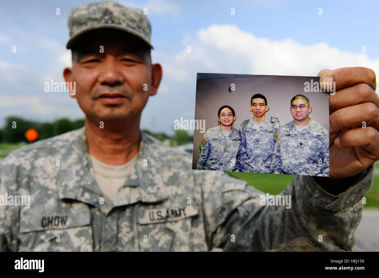 Sgt. 1st Class Andrew Chow, a personnel Soldier with the 205th Infantry ...