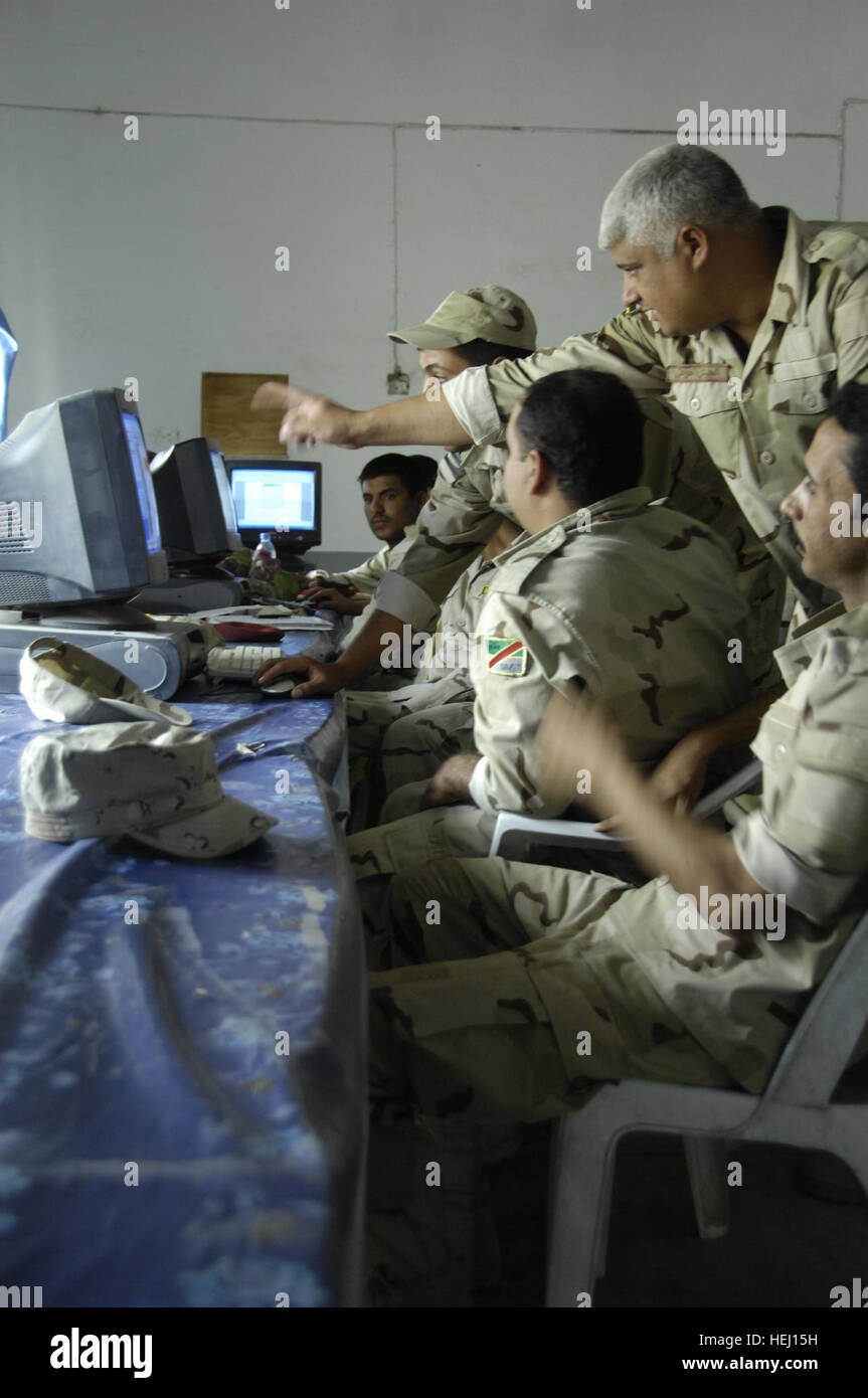 Iraqi soldiers, from the 10th Iraqi Army Division, practice their newly ...
