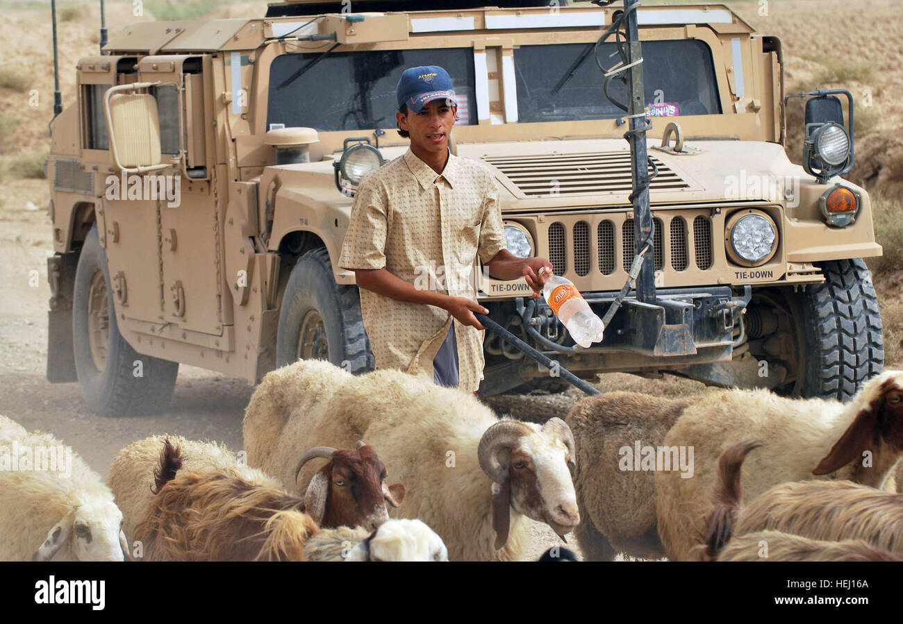 A U.S. Army humvee stops on a road in the small town of Salman Pak ...