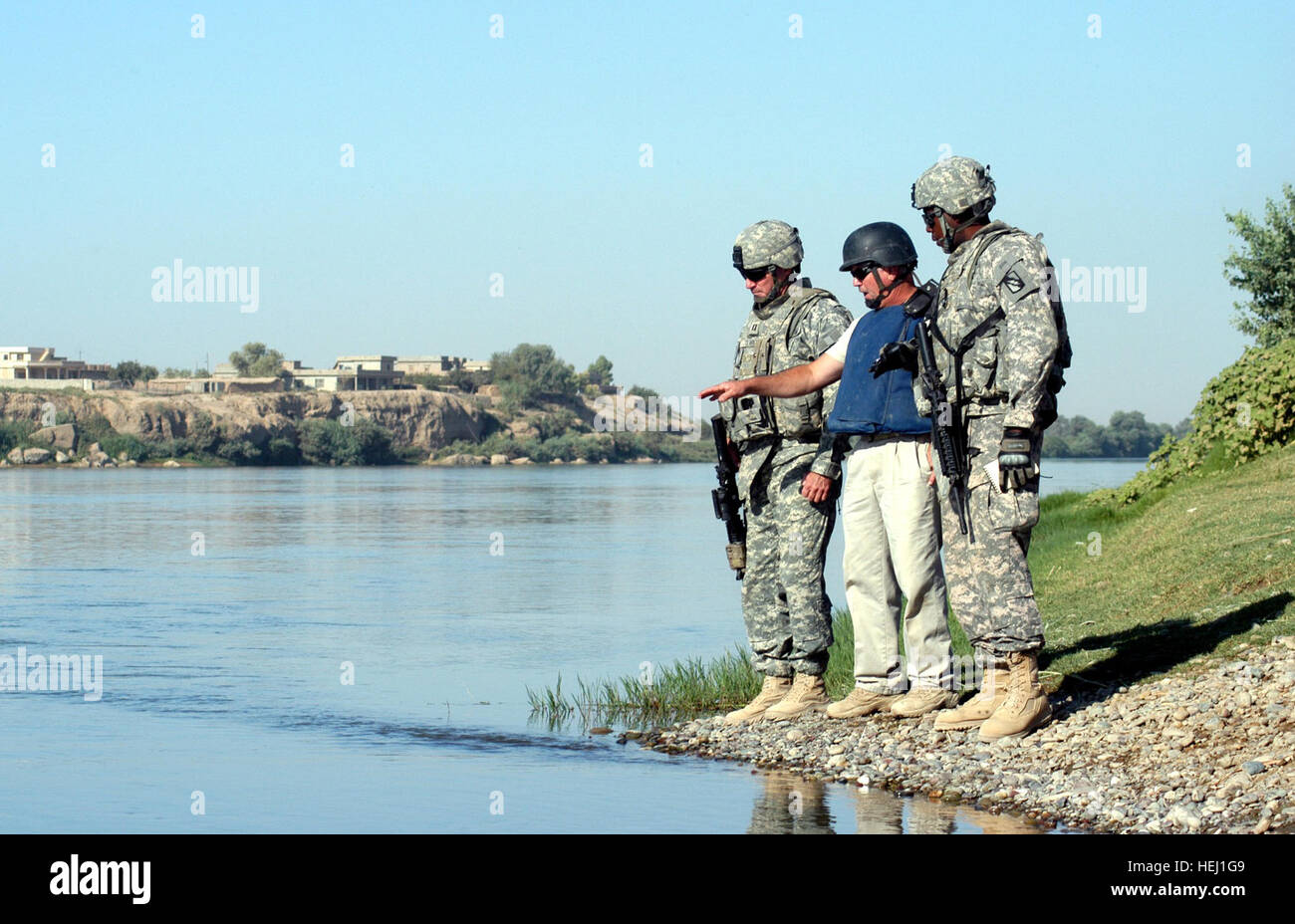 U.S. Army personnel from a force protection unit and water team operate ...