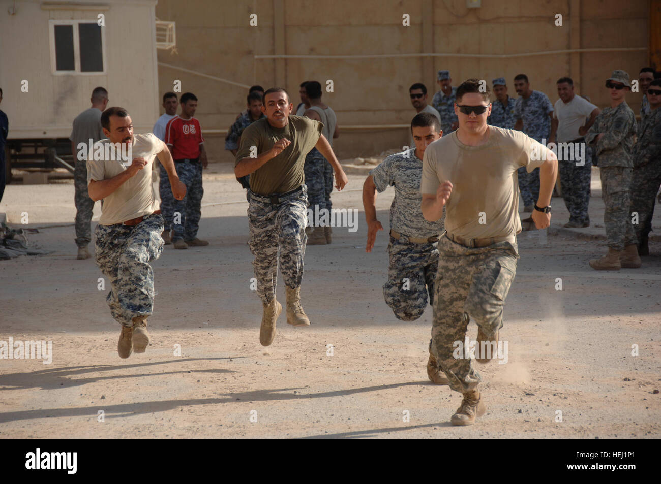Iraqi security forces from the 1st National Police Division, run ...