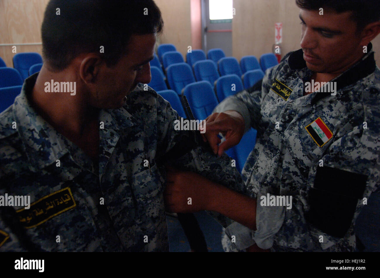 Iraqi security forces from the 1st National Police Division learn how ...