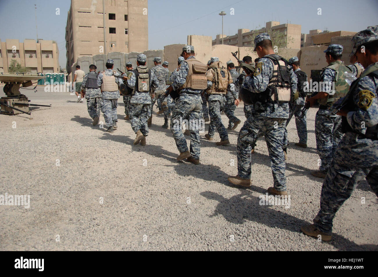 Iraqi security forces from the 1st National Police Division, march to ...