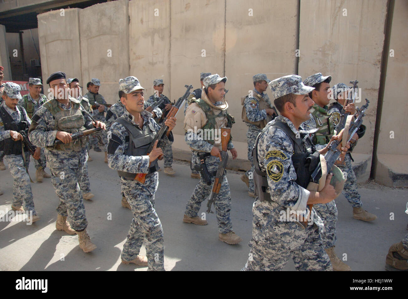 Iraqi security forces from the 1st National Police Division, march to ...
