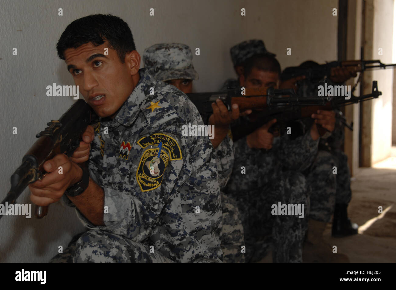 Members of Iraq's Wasit Federal Police Brigade provide security during ...