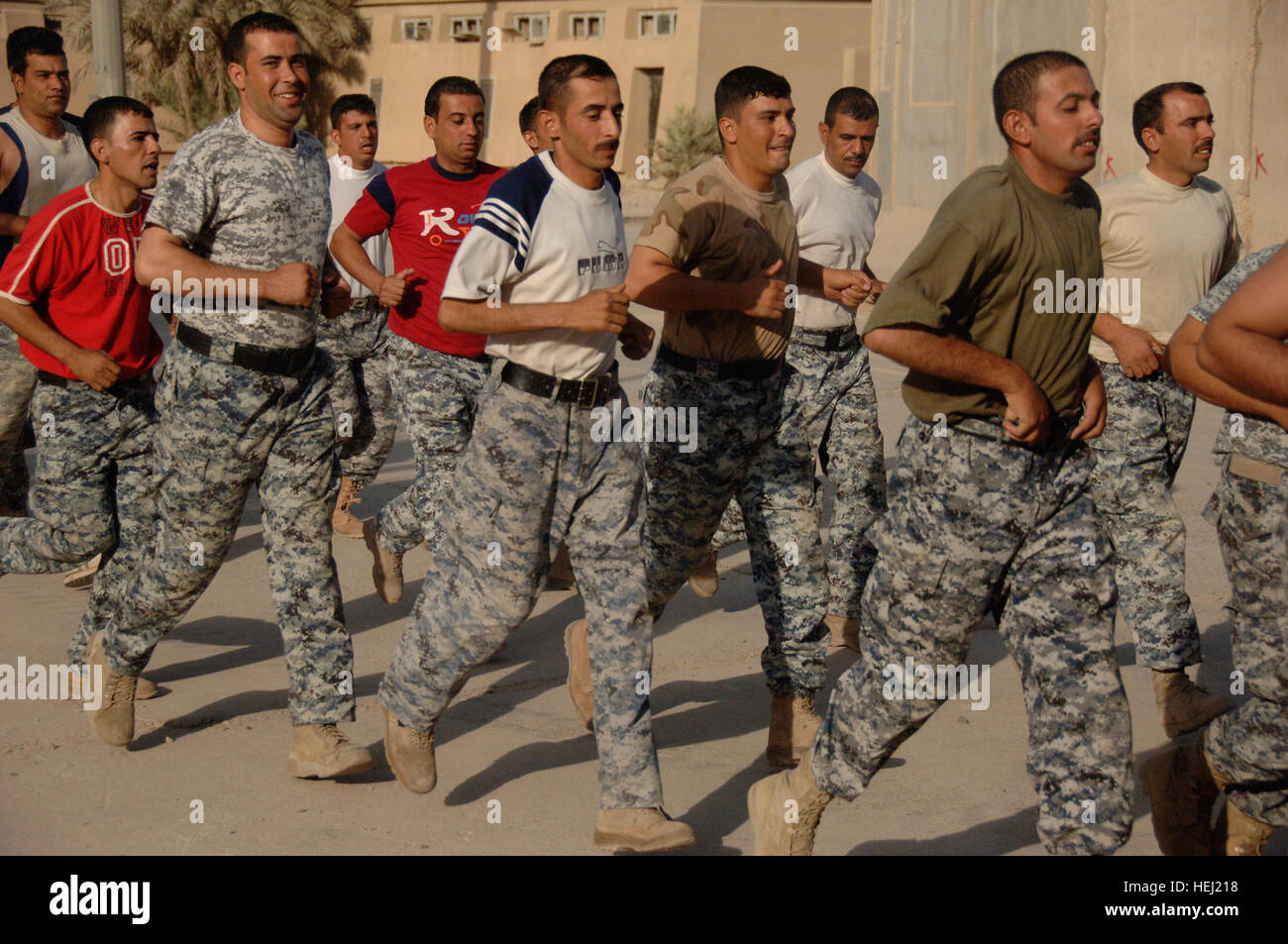 Iraqi security forces from the 1st National Police Division begin a ...