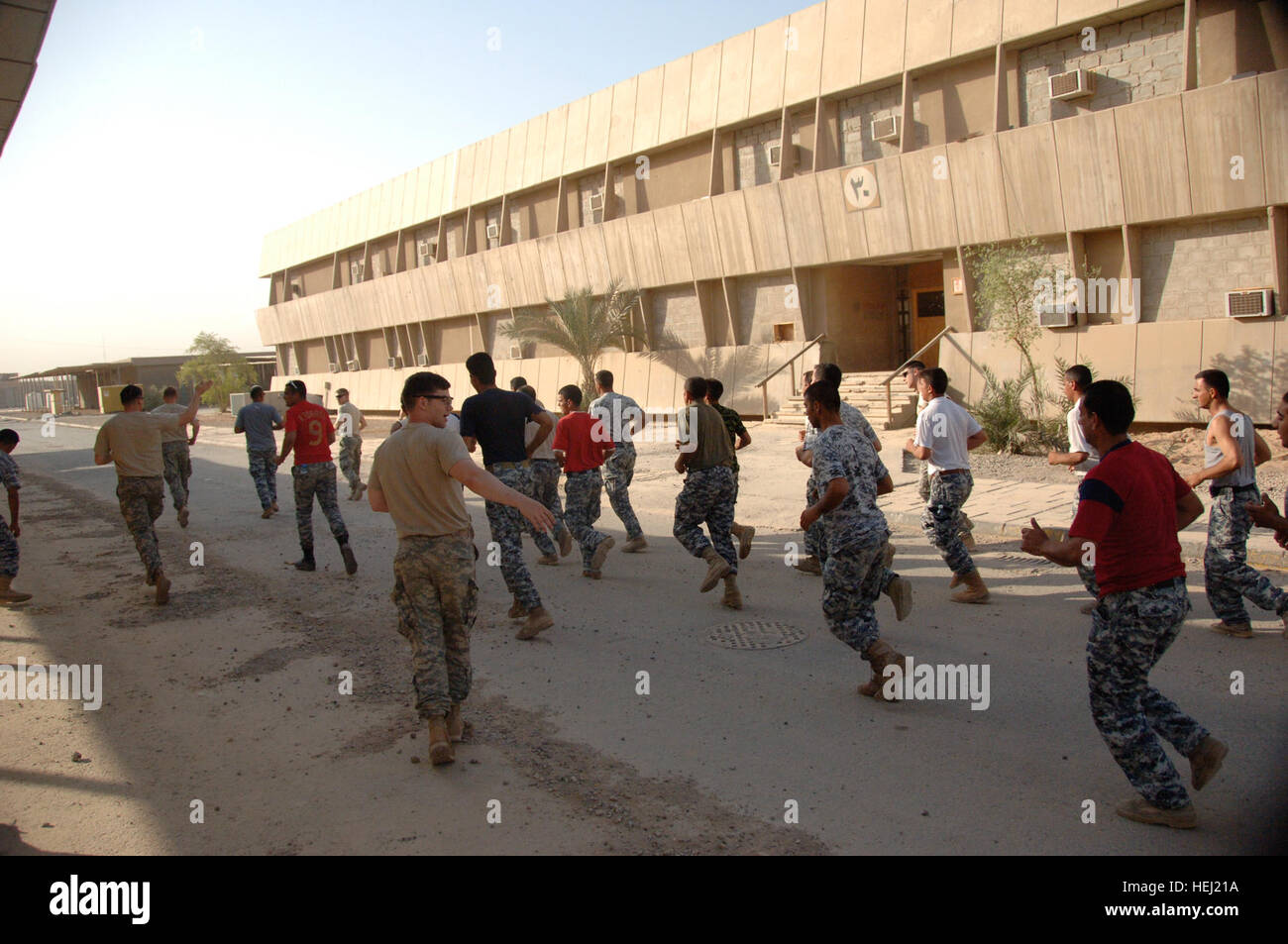 Iraqi security forces from the 1st National Police Division begin a ...