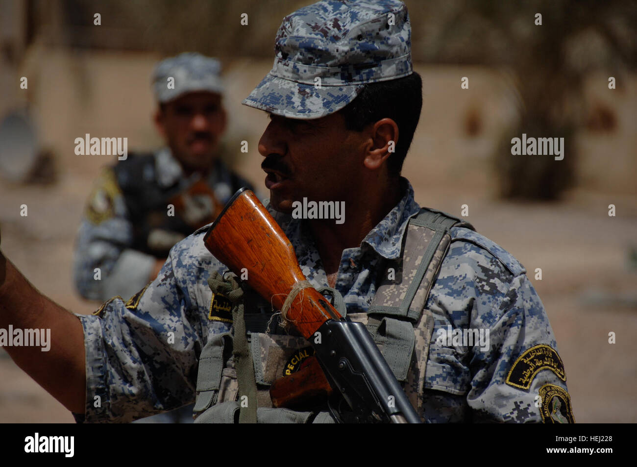A member of the Iraqi security forces from the 1st National Police ...