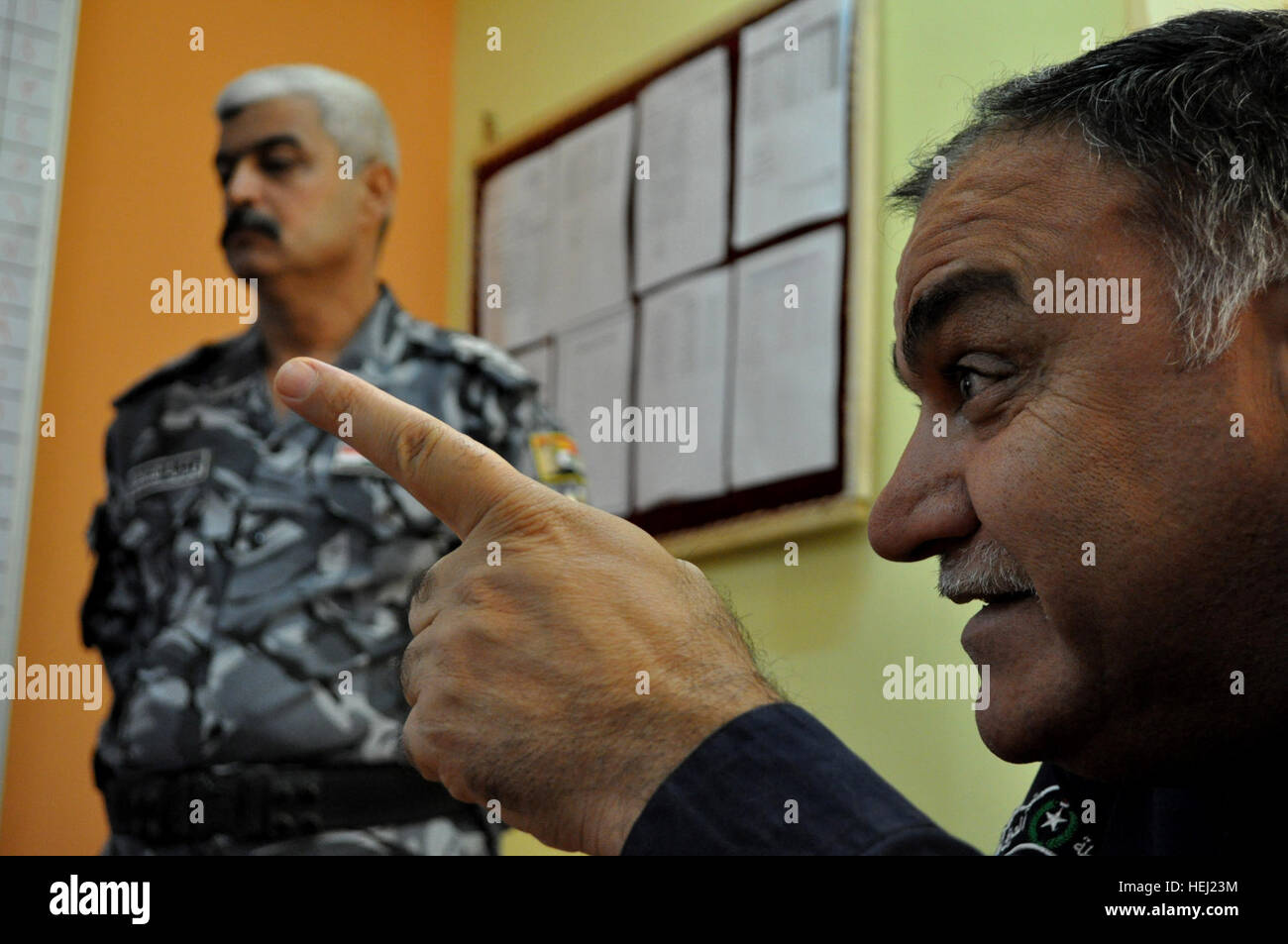 Al Furat Training Academy police chief briefs Maj. Gen. Richard Rowe ...