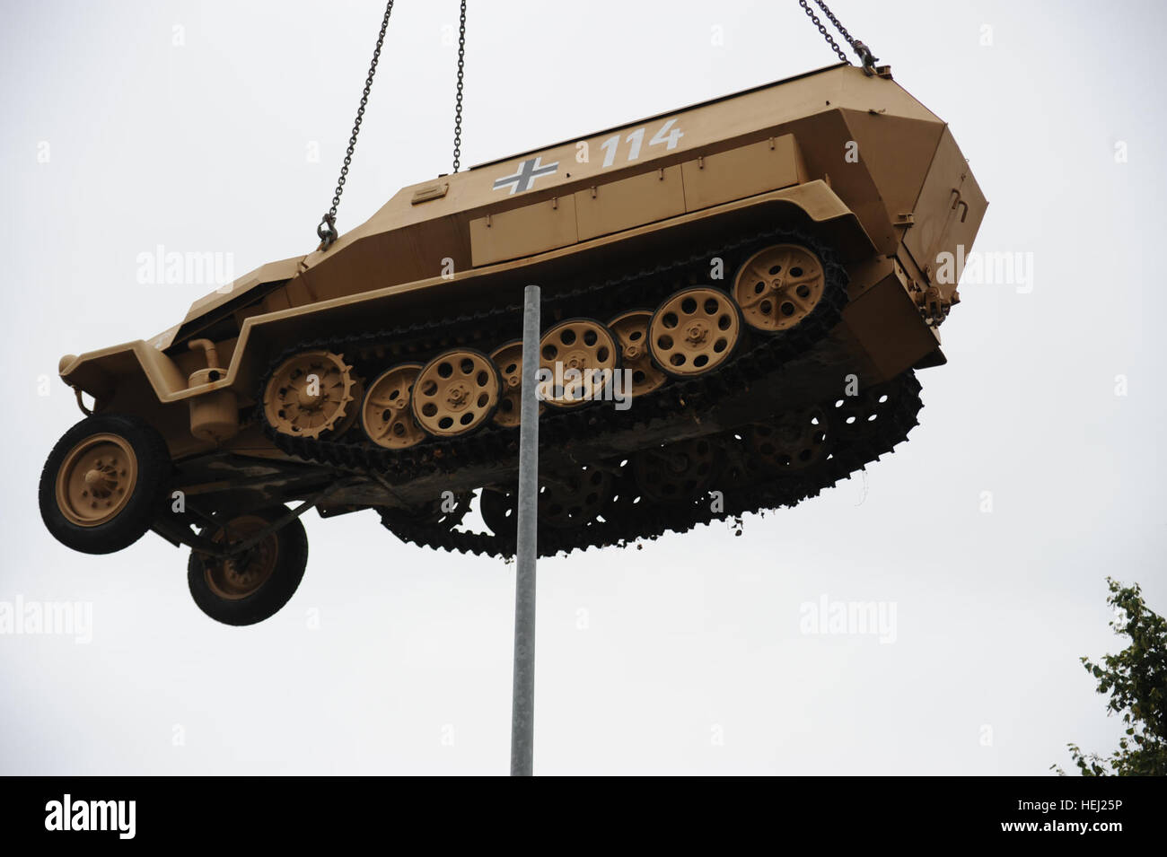 A historical World War II German SdKfz 251 Halftrack hovers about the ...
