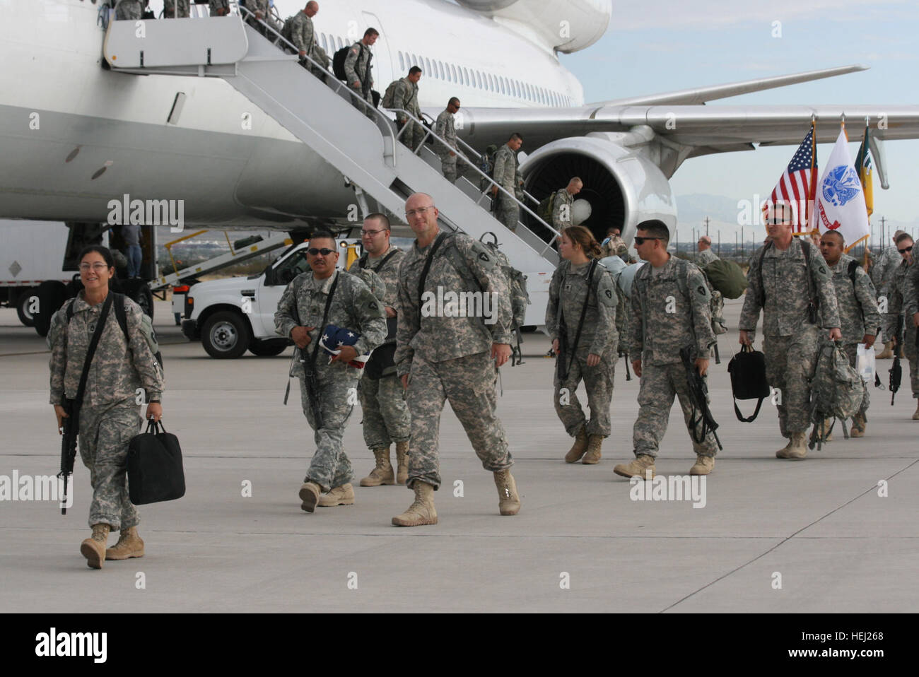 Guardsmen from the 56th Infantry Brigade Combat Team deplane at Biggs ...