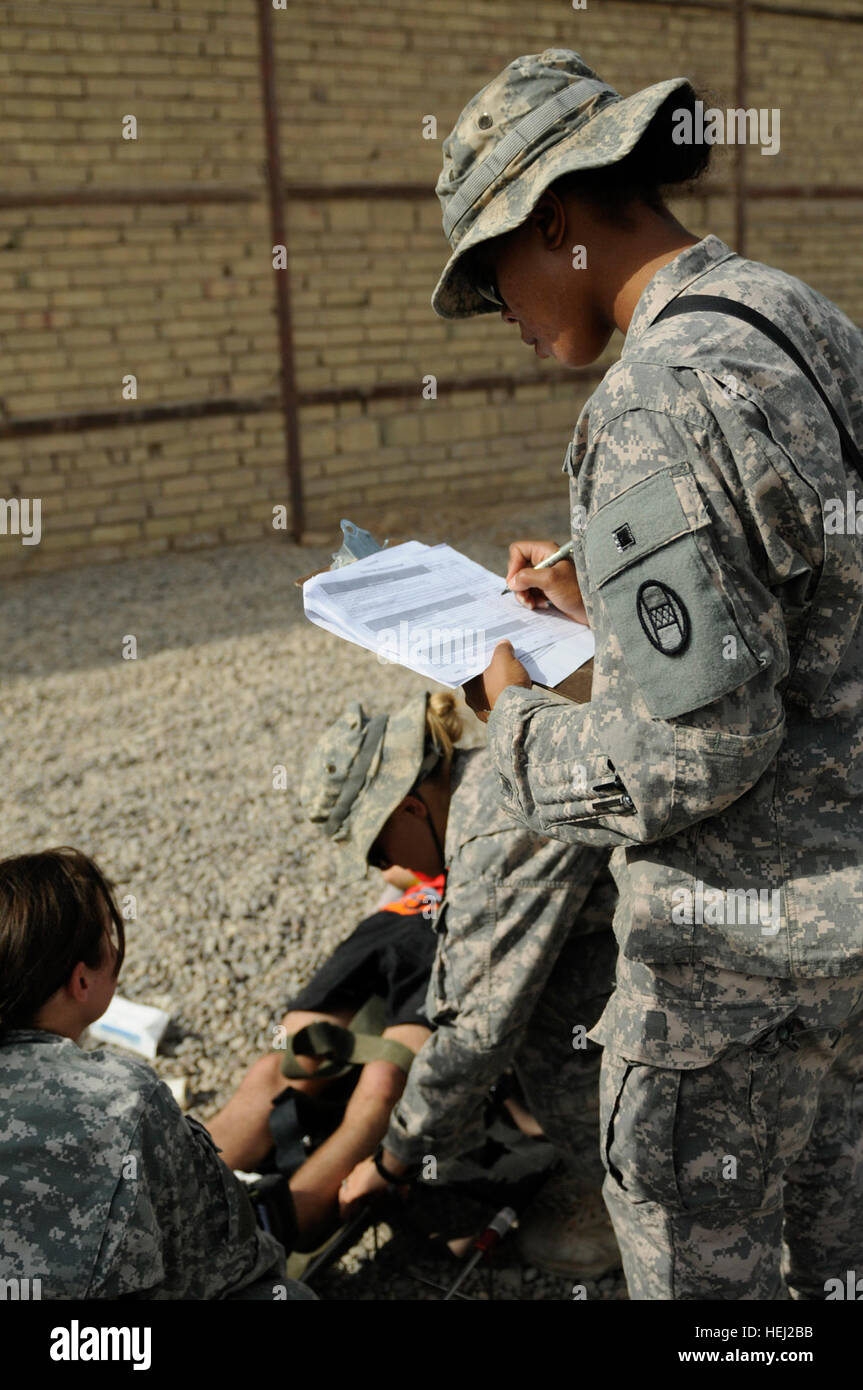 Sgt. Tatjuana Wood (standing), a Detroit native with Company C, 230th ...
