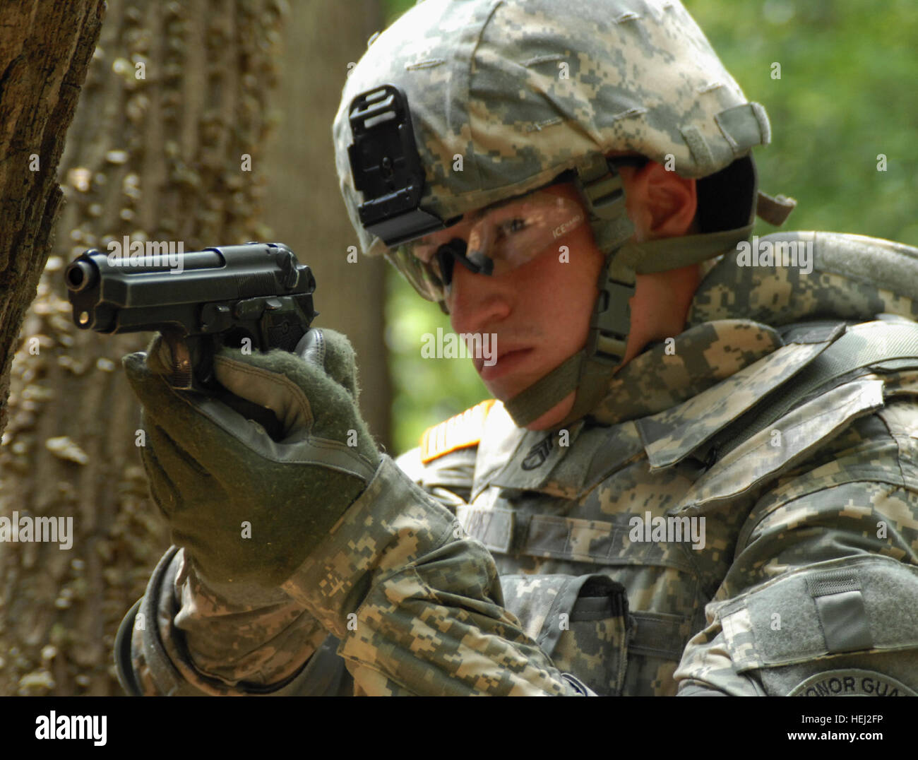 M9 Pistol combat in woods Stock Photo - Alamy