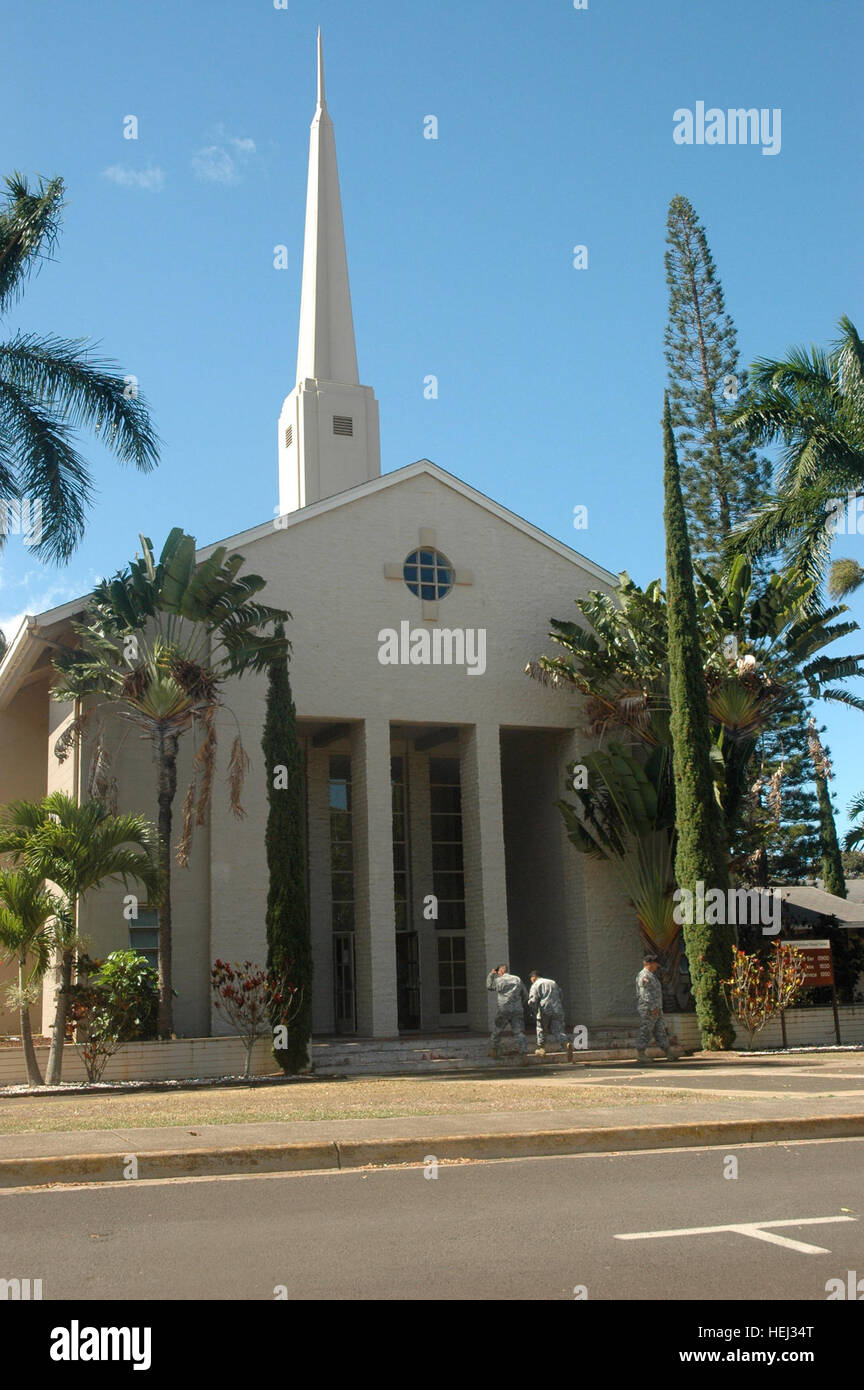 Soldiers make their way into the Main Post Chapel at Schofield Barracks ...