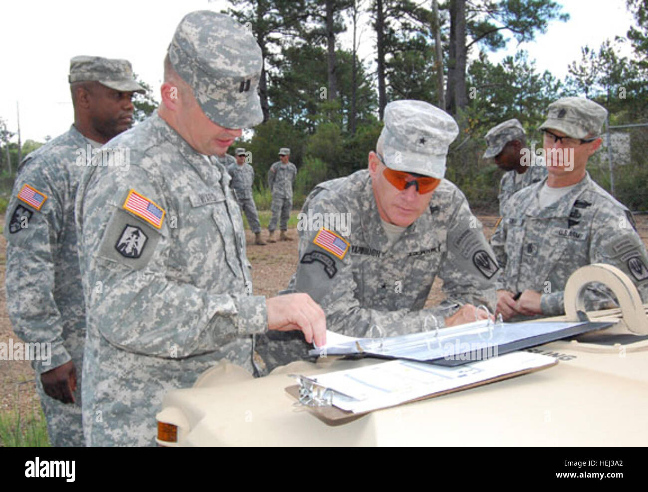 Capt. Bryan Ward (left), commander, D Battery, 5th Battalion, 353rd ...