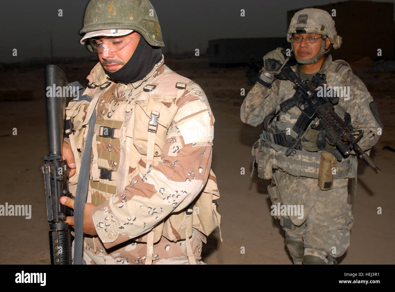 US Army 51060 BAGHDAD - Staff Sgt. Benito Santos (right), an infantry ...
