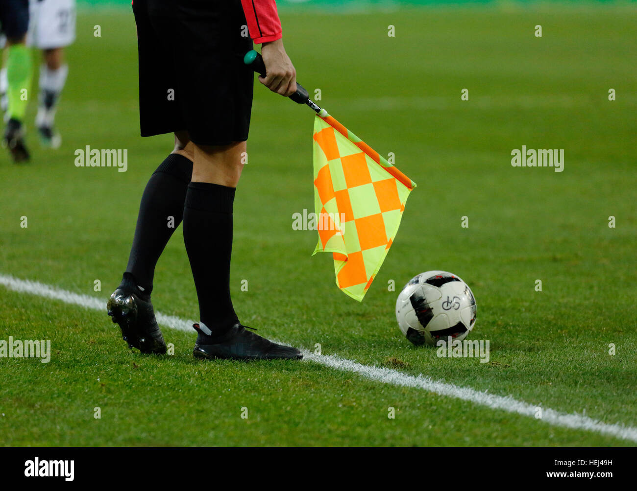 sports, football, symbolism, assistant referee, linesman with flag and ...
