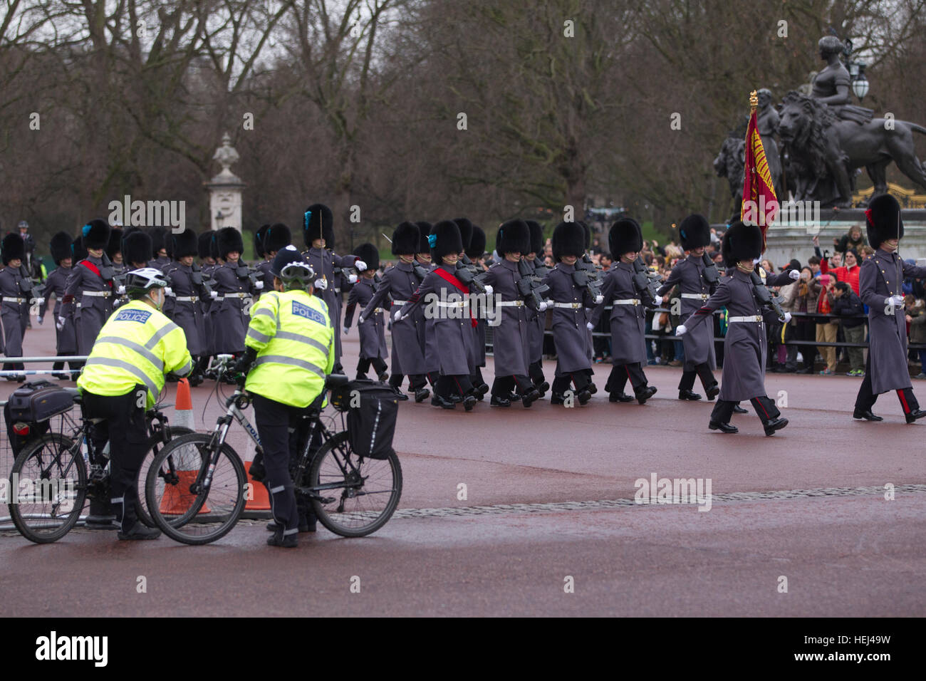 Armed police provide security during the Changing of the Guard outside ...