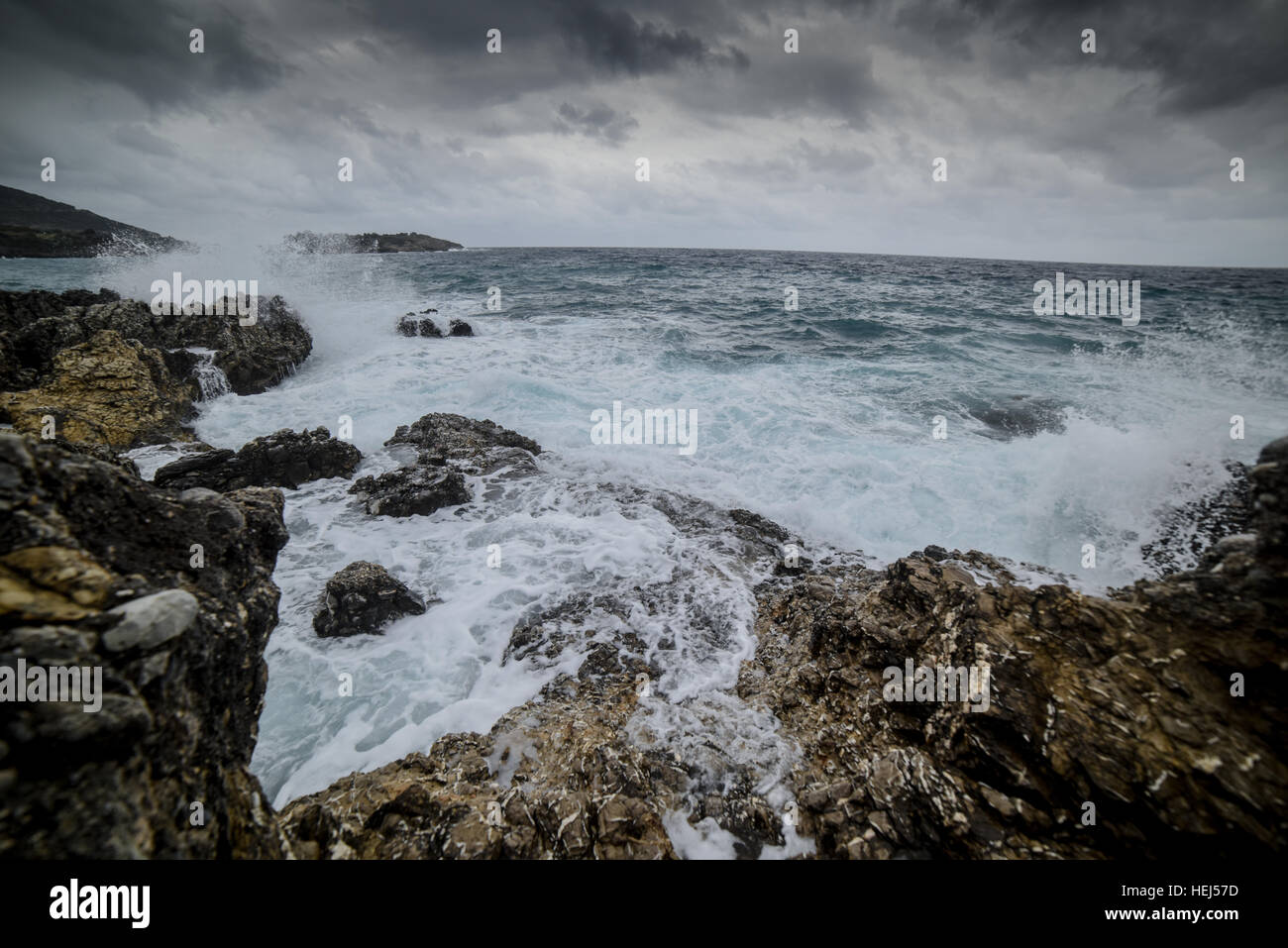 Waves flowing through the rocks at Mani, Greece Stock Photo - Alamy