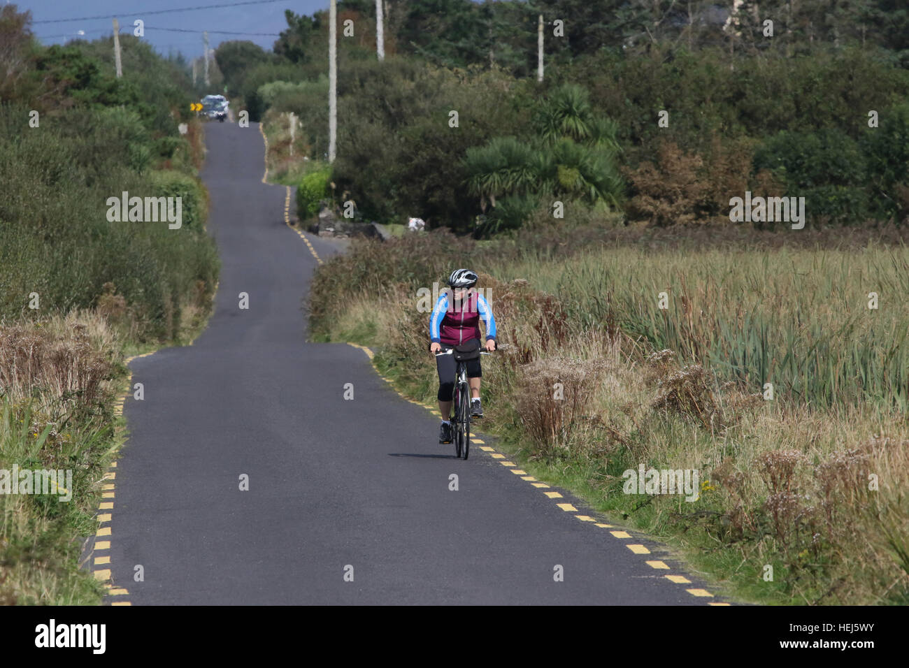 Cyclist in rural ireland hi-res stock photography and images - Alamy