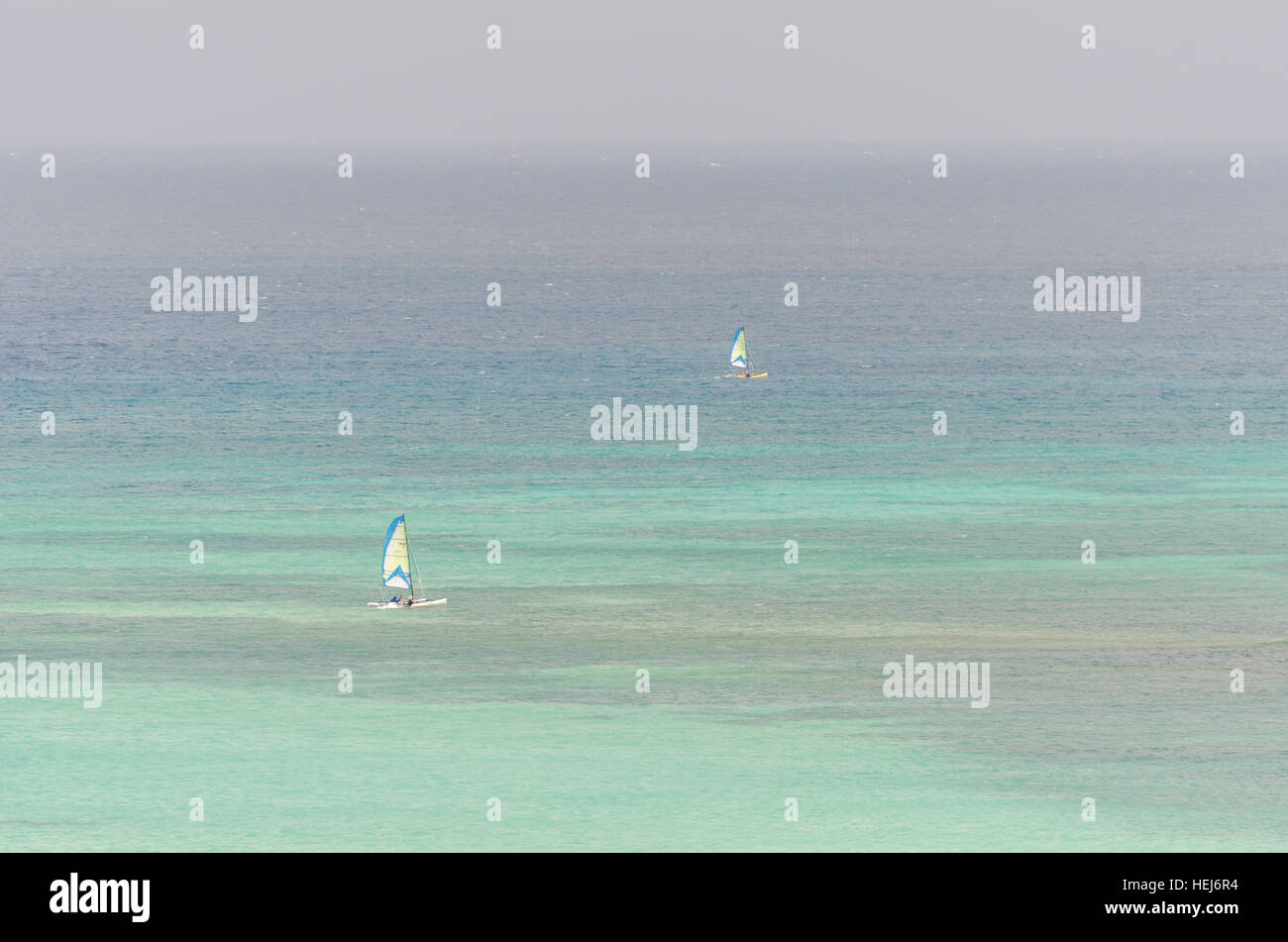 Summer time in the Caribbean with boats on the water in Aruba ...