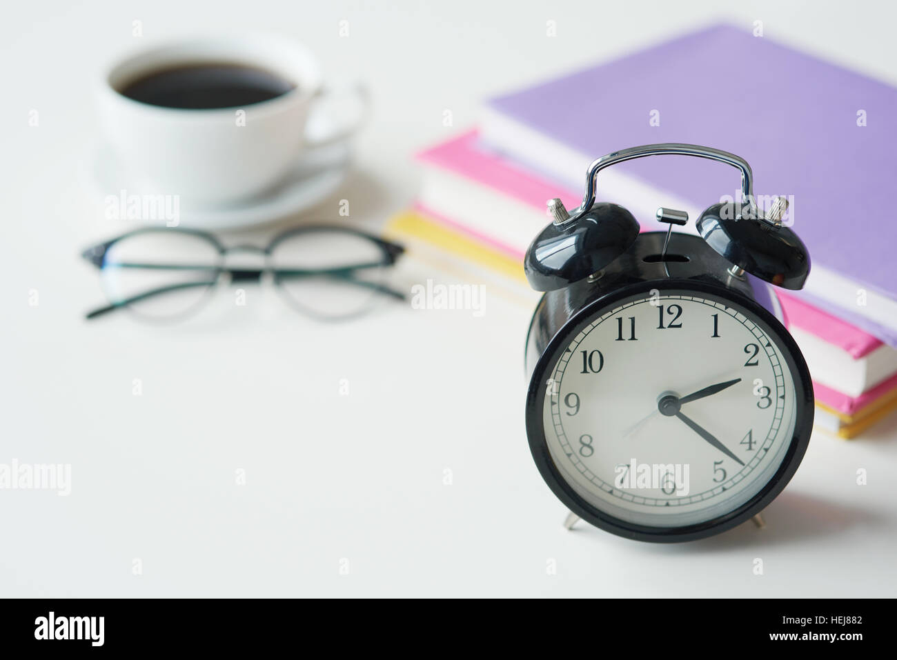 Old fashioned alarm clock in the main plan Stock Photo - Alamy