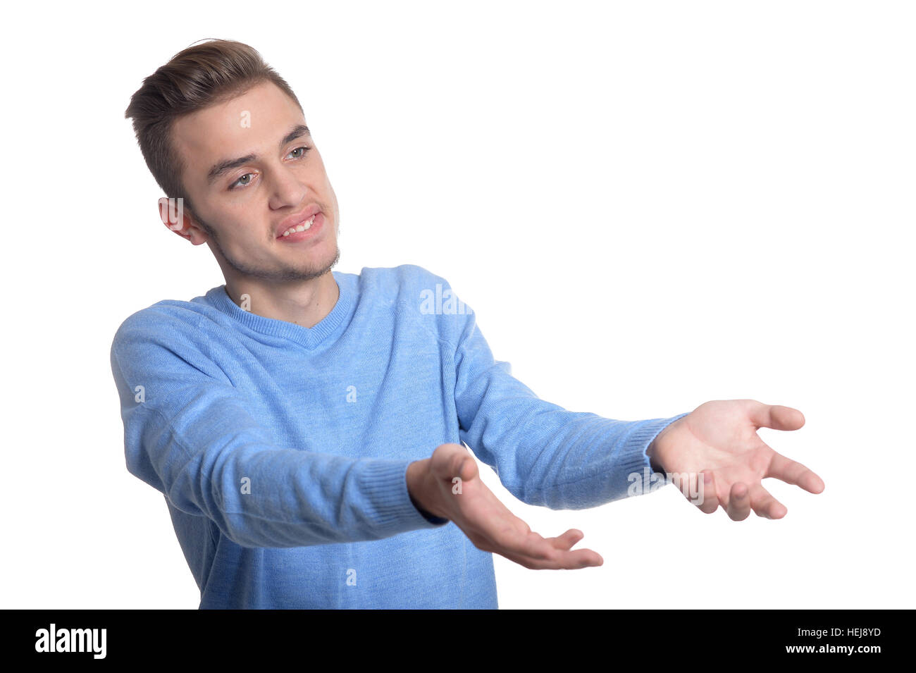 Young man gesturing Stock Photo - Alamy