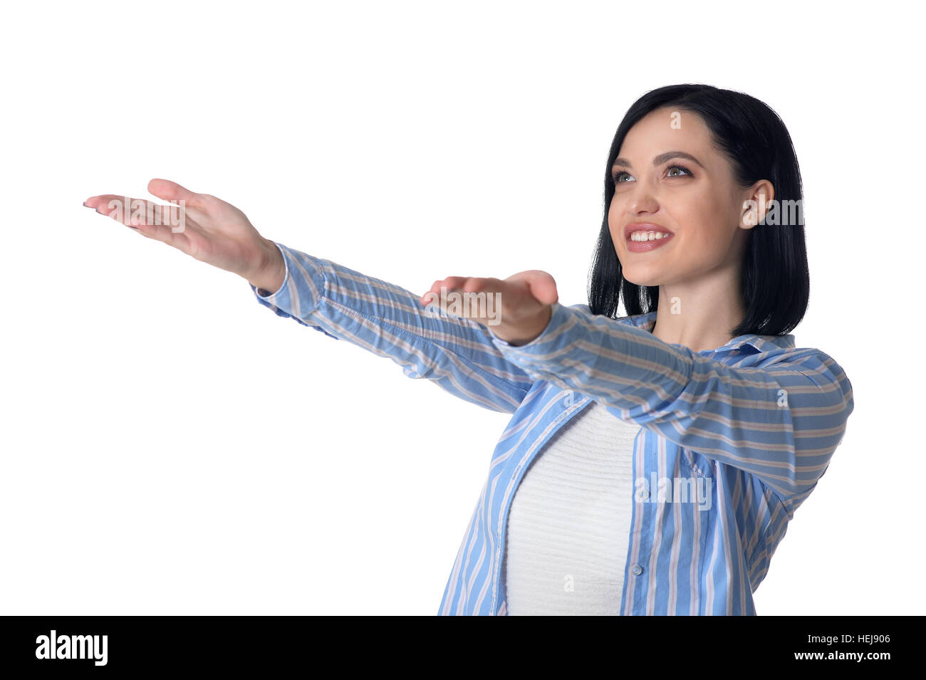 Young woman pointing Stock Photo - Alamy
