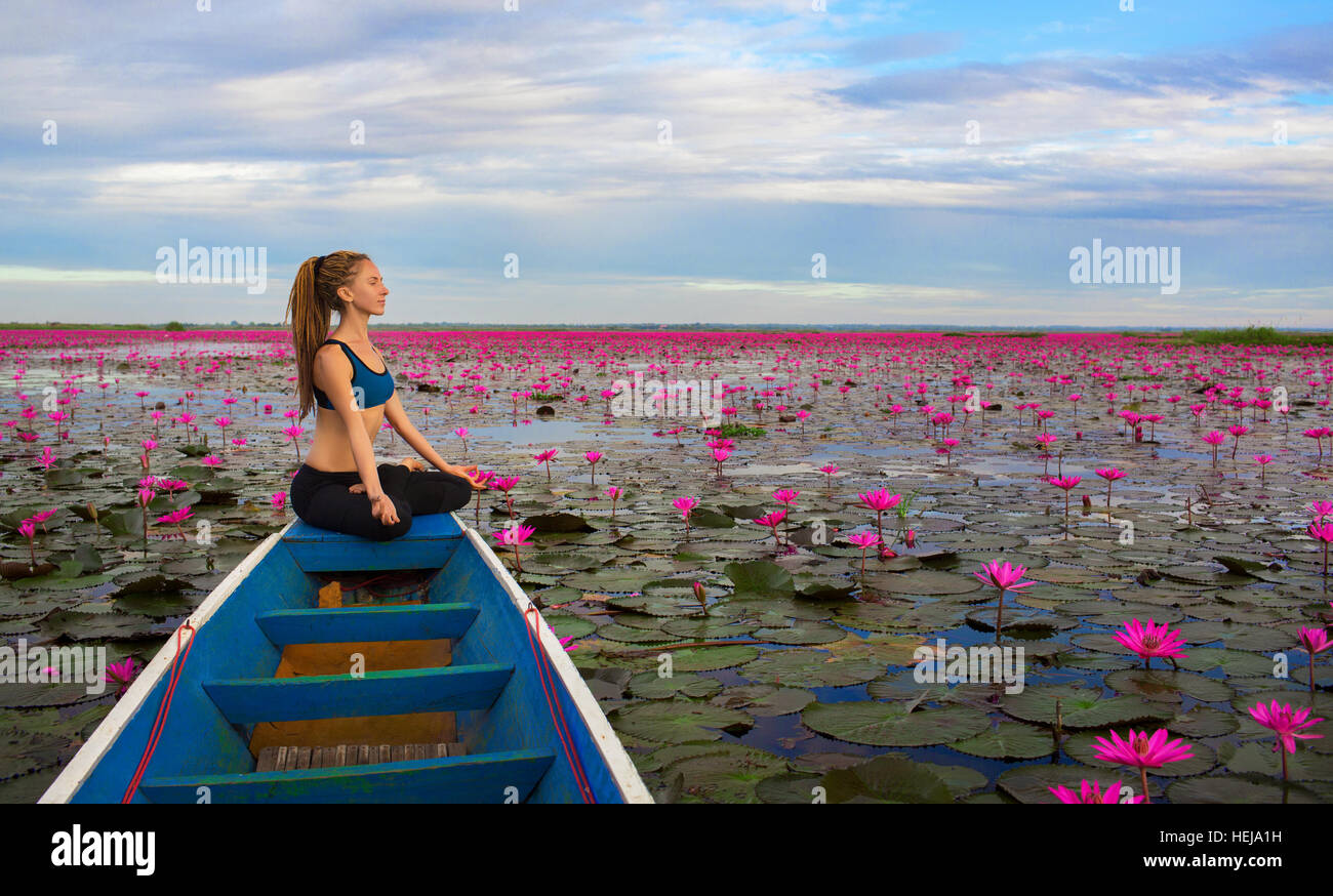serenity and yoga practicing on the Red Lotus Sea,Thailand Stock Photo ...