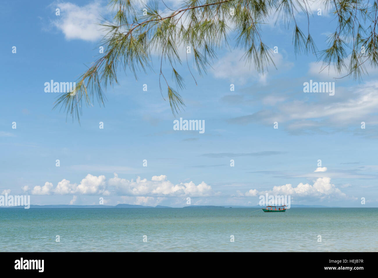 Boat on calm sea Stock Photo - Alamy