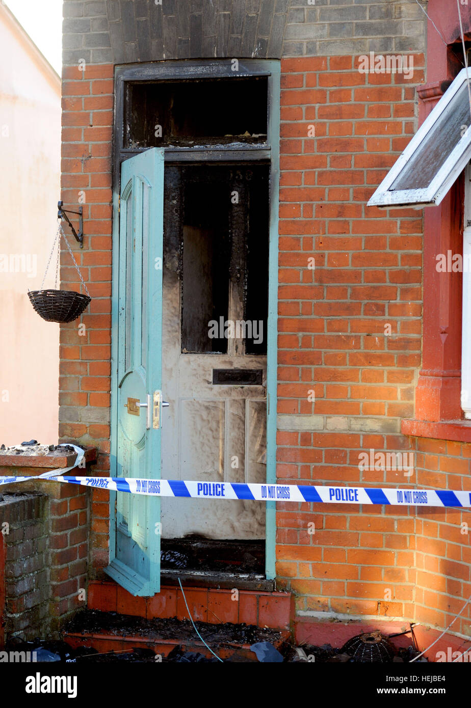 The burnt front door of a house in Braintree, Essex, after a fire ...