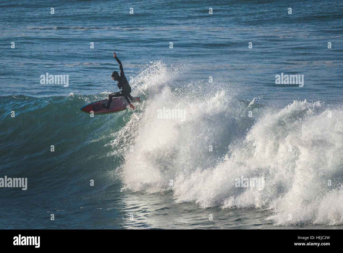 Spectacular surfing action as a surfer rides a big wave at Little ...